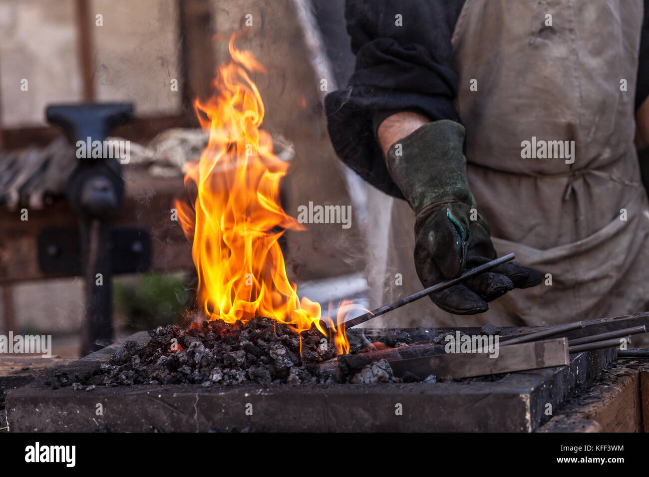 Detail shot of metal being worked at a blacksmith forge Stock Photo - Alamy