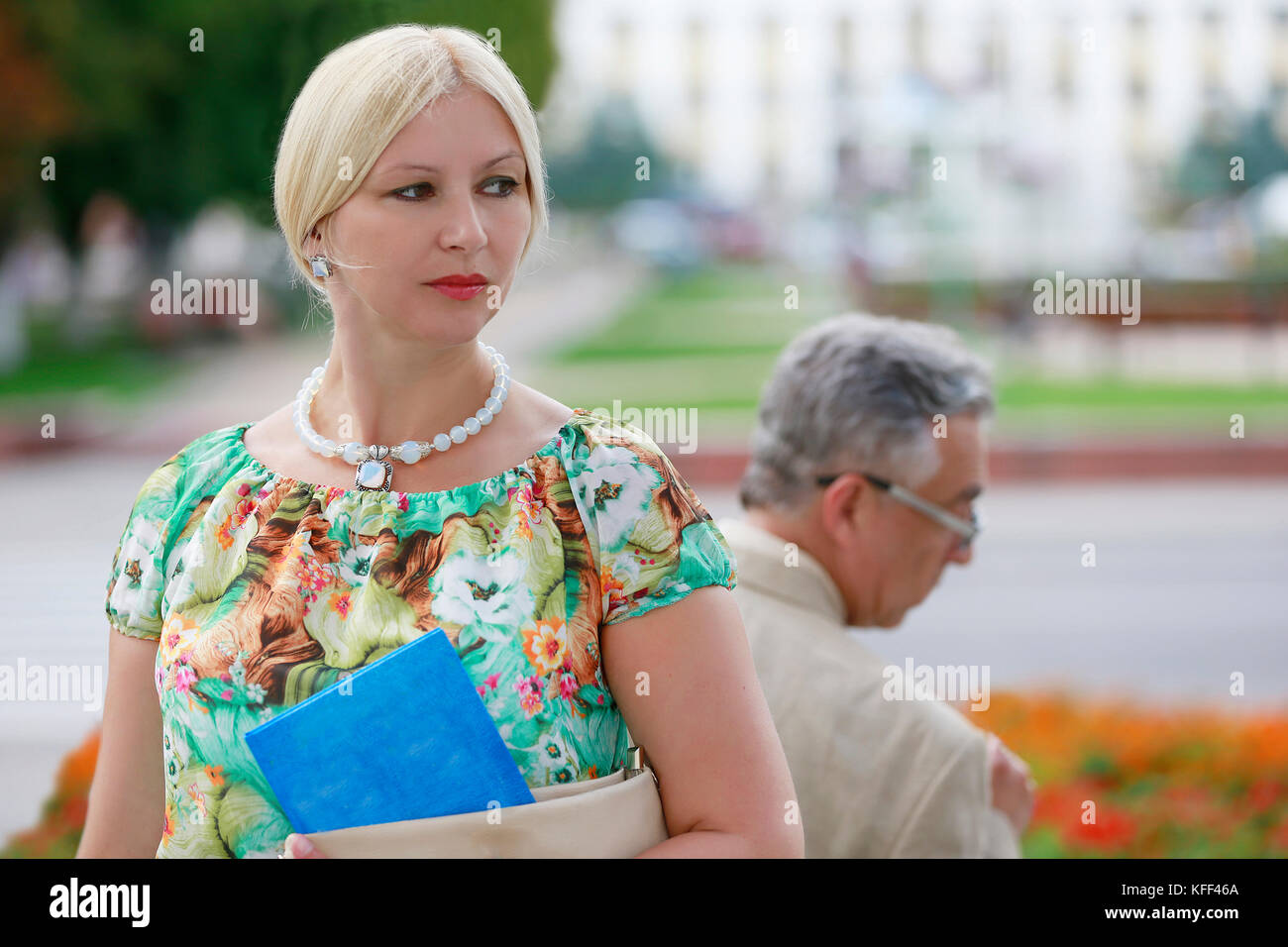 Meeting a woman with a man. Parting woman with a man Stock Photo - Alamy