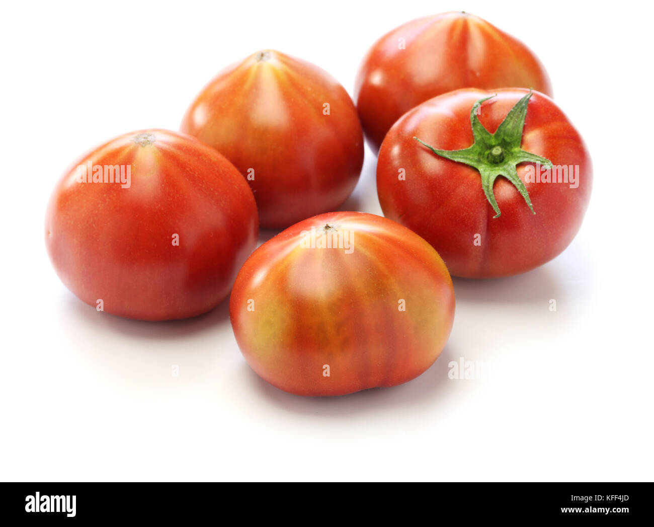 fresh japanese tomatoes isolated on white background Stock Photo - Alamy