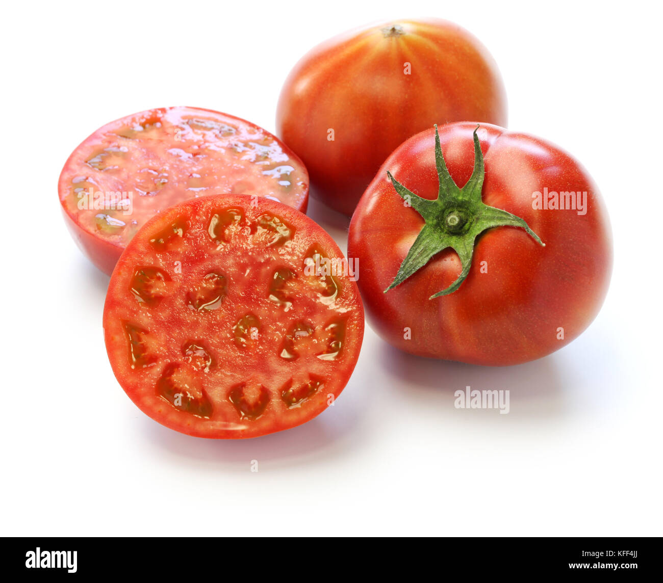 fresh japanese tomatoes isolated on white background Stock Photo - Alamy