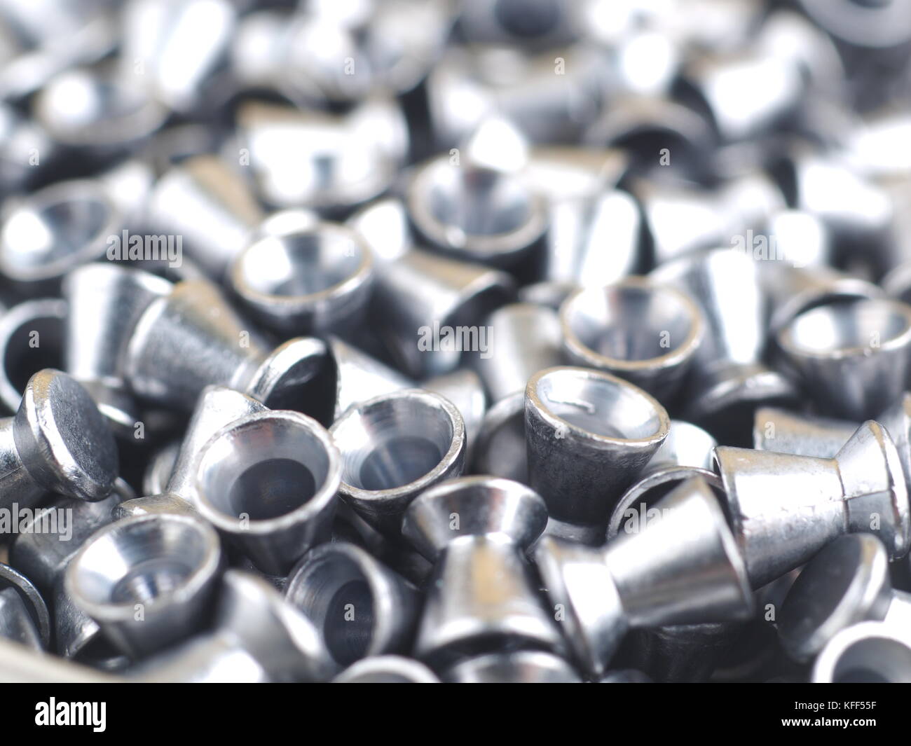 airgun bullets on a white background Stock Photo - Alamy