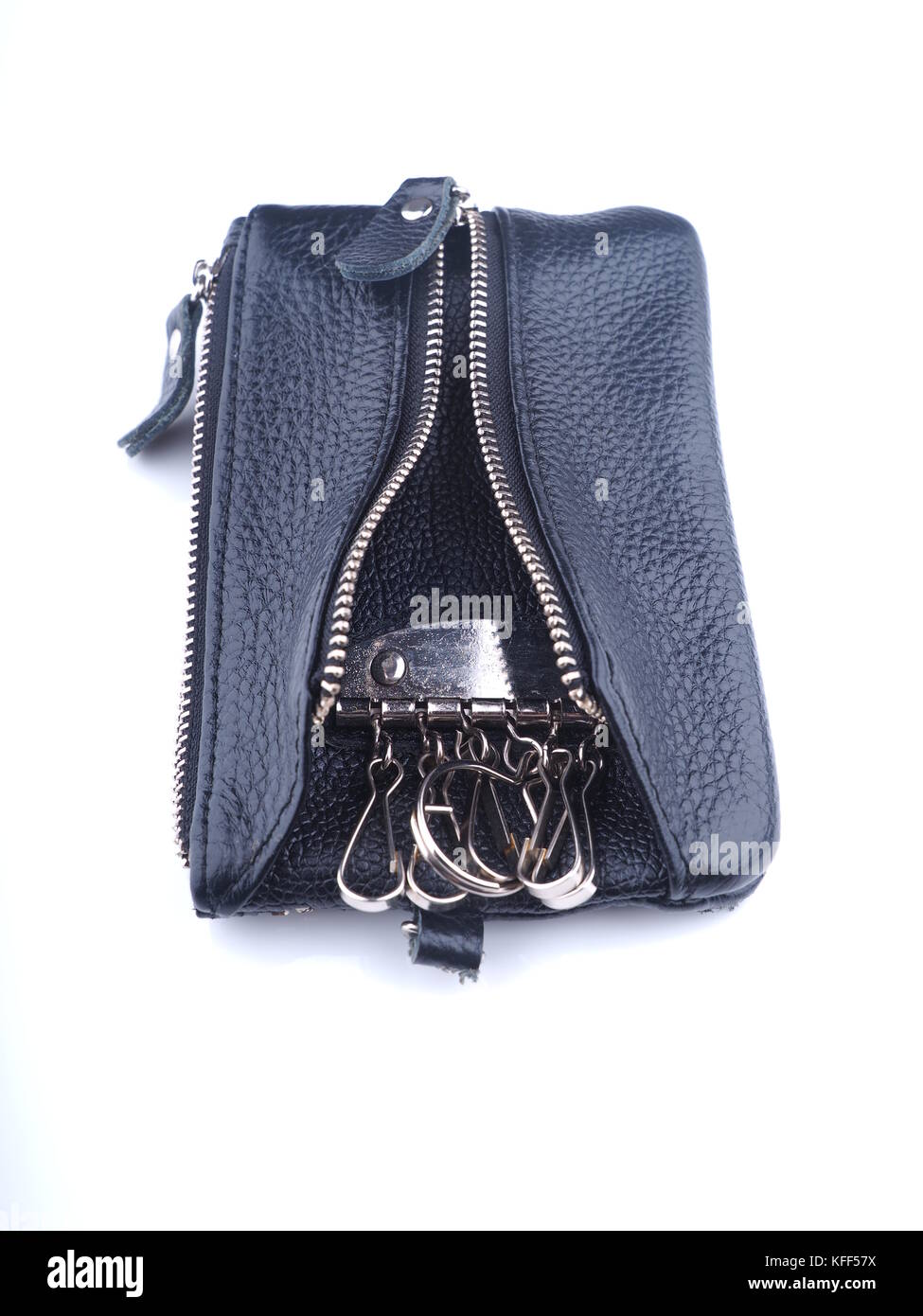 black purse with keys on a white background Stock Photo - Alamy