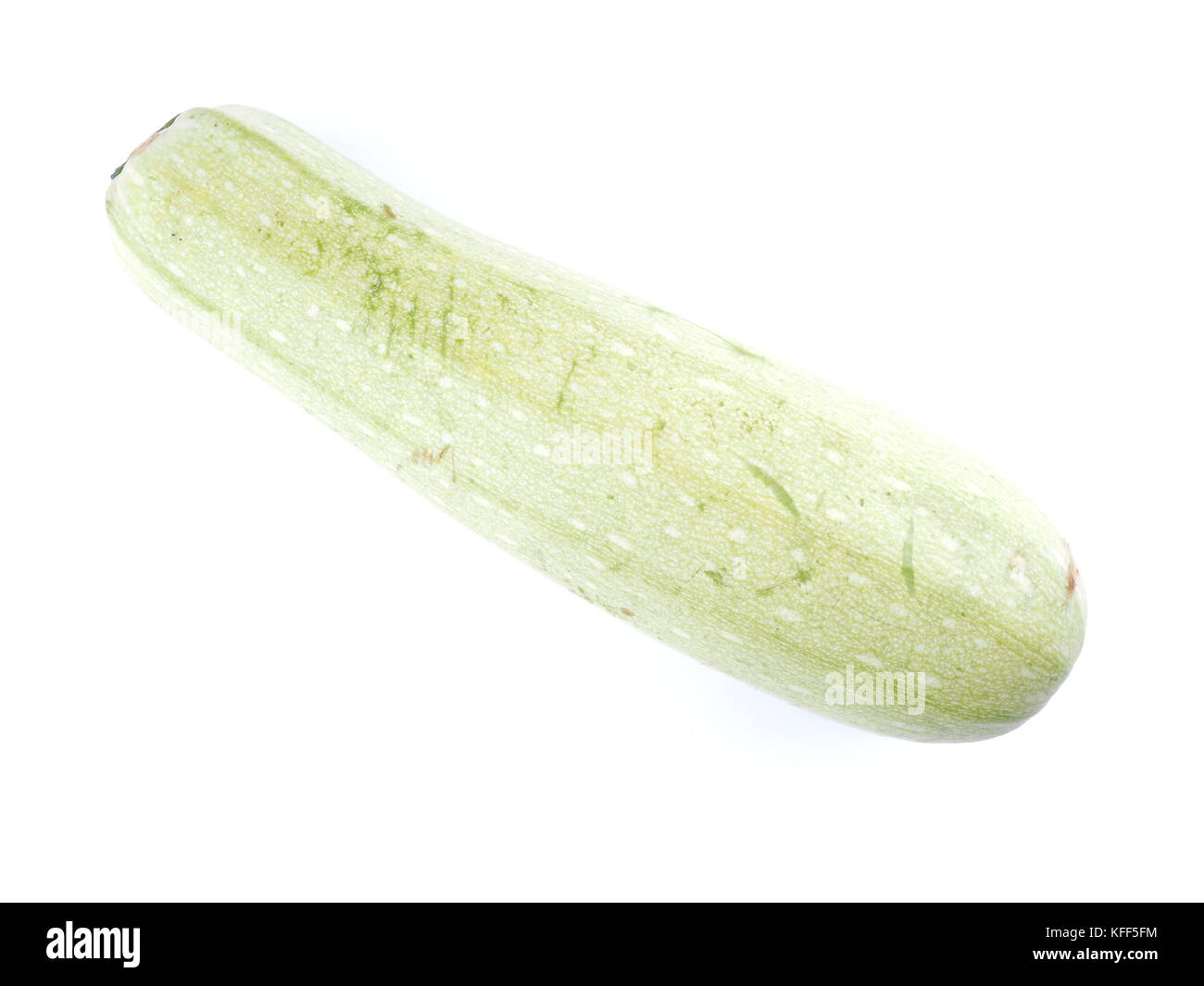 green courgette on white background Stock Photo - Alamy