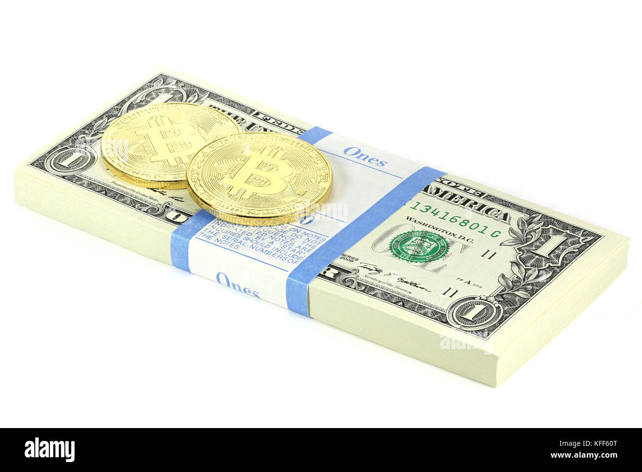 golden bitcoins on bundle of 1 US Dollar notes isolated on white ...