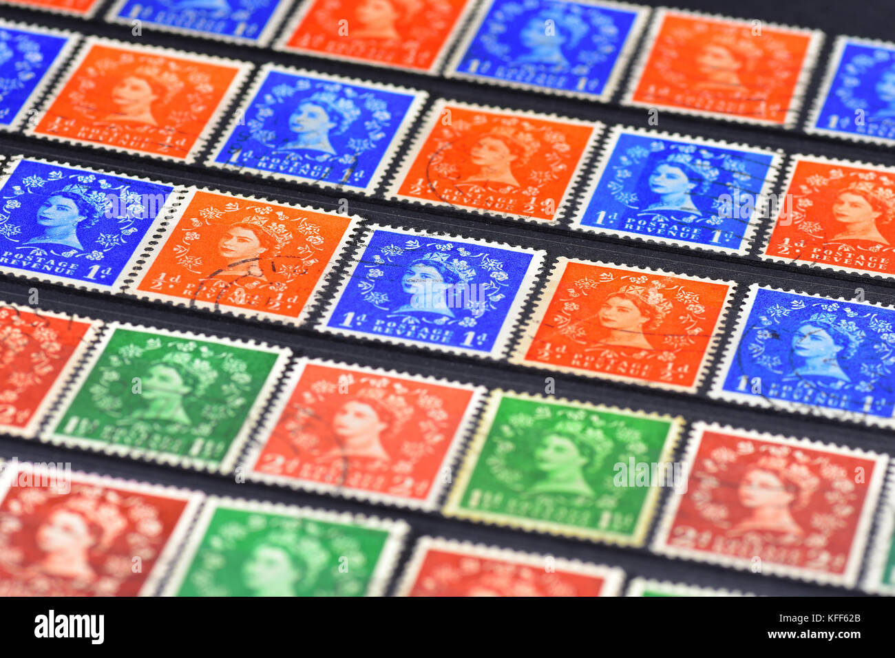 Old British empire stamp collection - Queen Elizabeth II Stock Photo ...