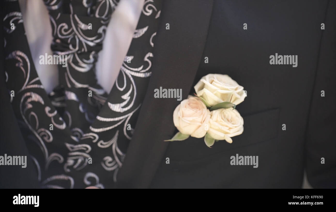 Red carnation buttonhole hi-res stock photography and images - Alamy