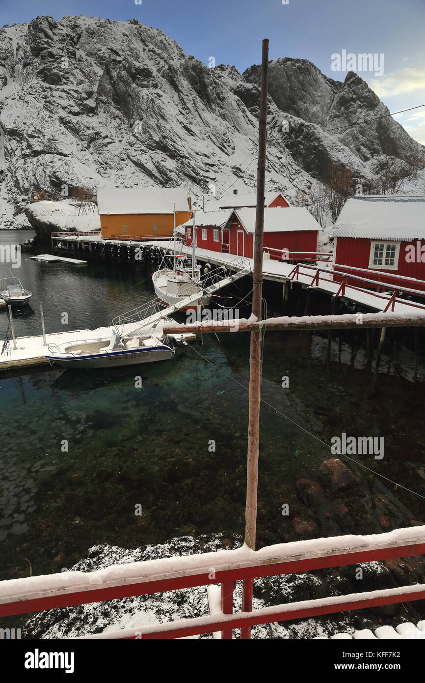 N.E.-wards view over the snow covered harbor with floating moorings and ...
