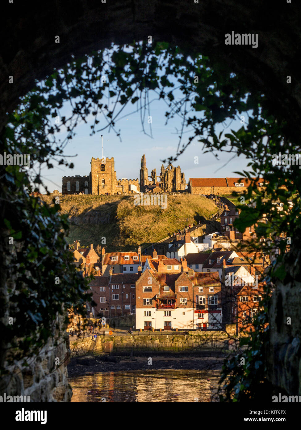 Whitby Abbey and St Mary’s Church on East Cliff, framed through the ...