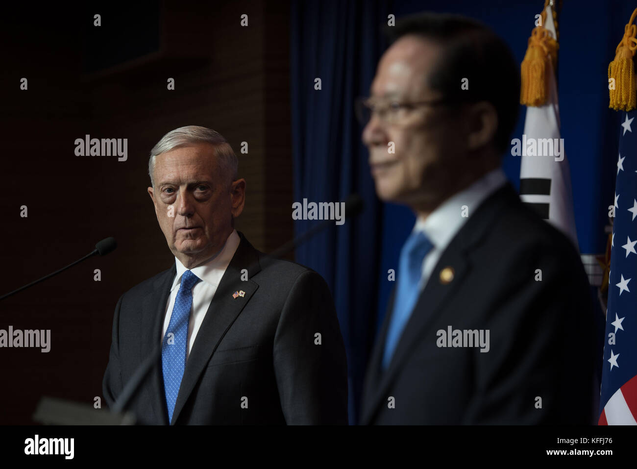 U.S. Secretary of Defense Jim Mattis, left, listens to South Korean ...