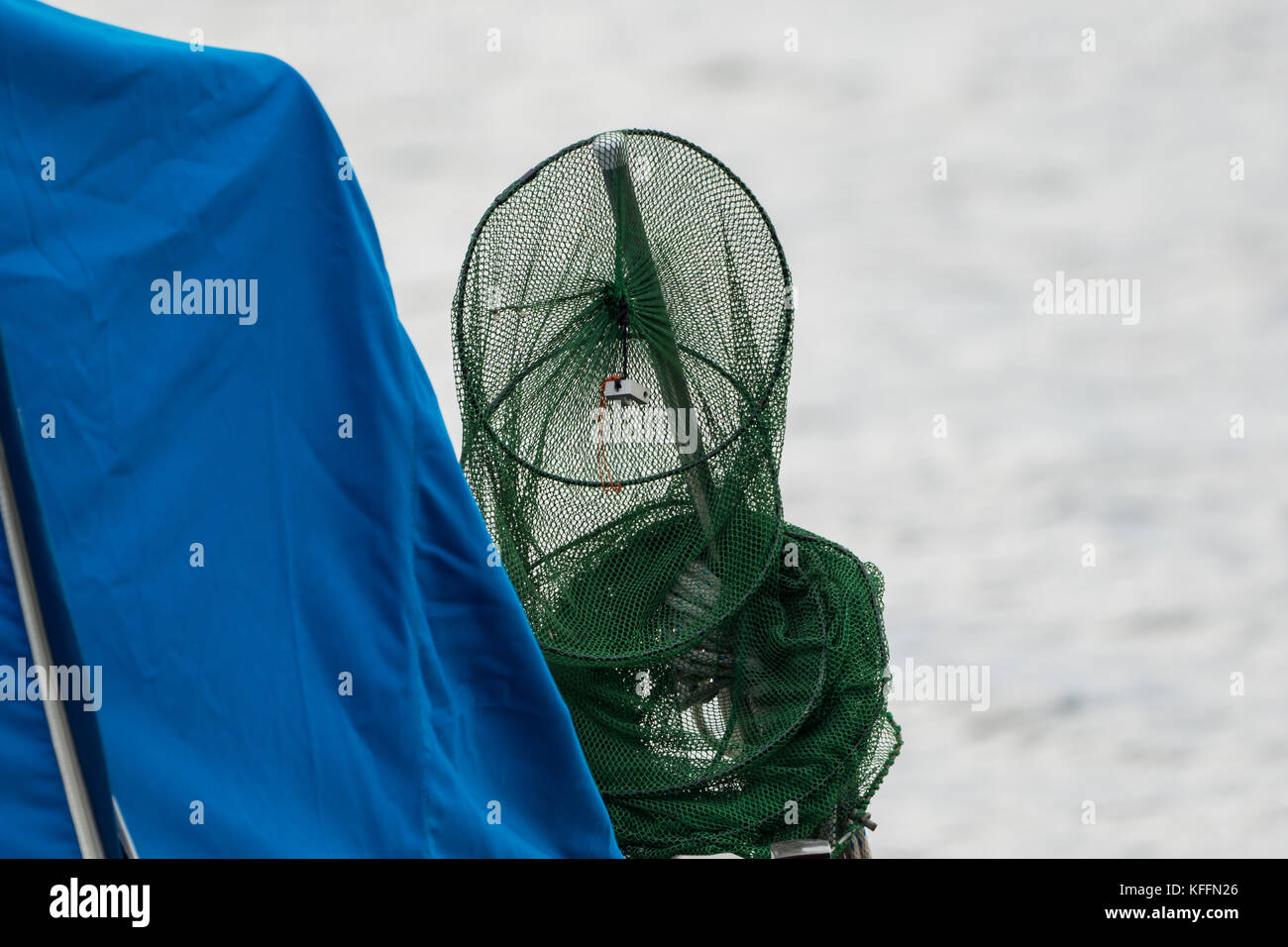Fishing net on a boat Stock Photo - Alamy