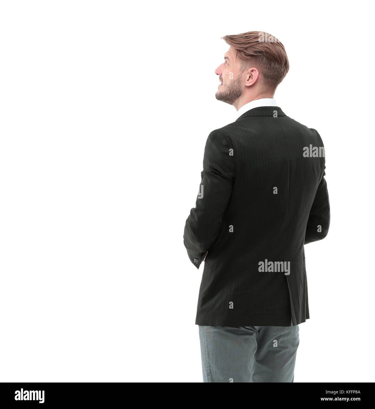 Businessman from the back - looking at something over a white ...