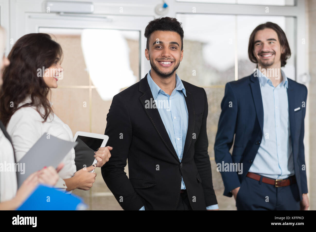 Hotel Receptionist Meeting Business People Group In Lobby Stock Photo ...