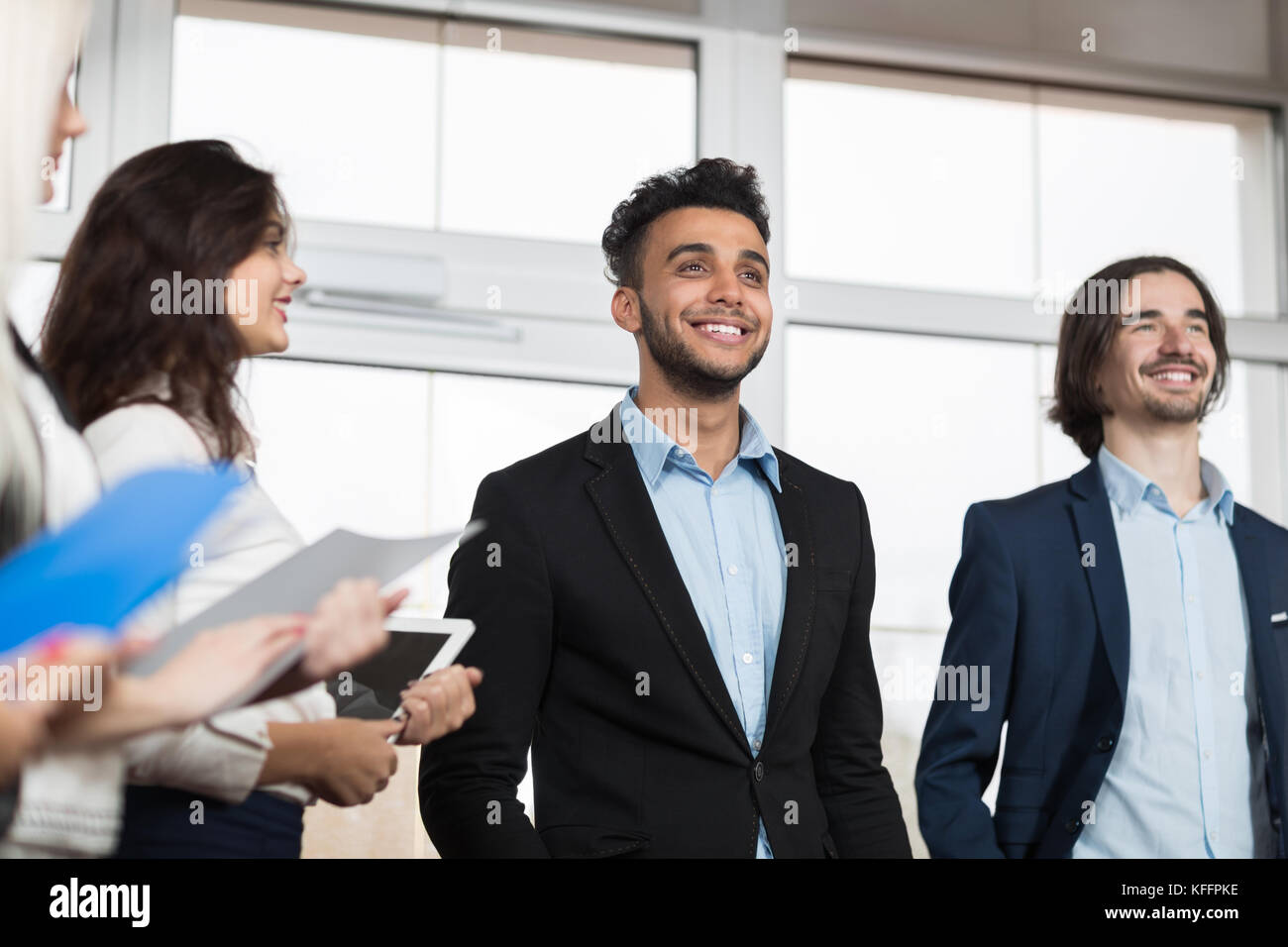 Hotel Receptionist Meeting Business People Group In Lobby Stock Photo ...