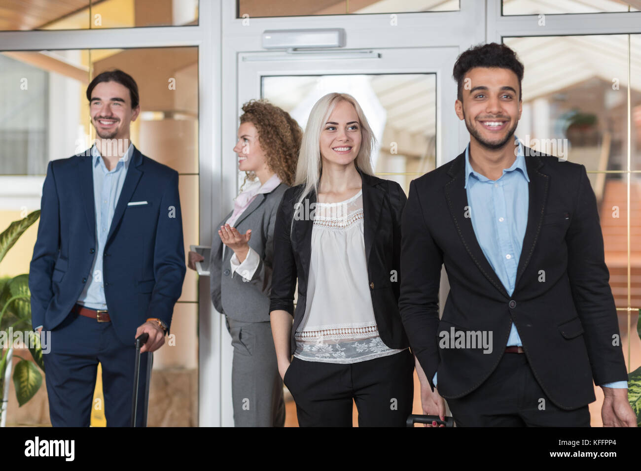Guests arrive suitcase hi-res stock photography and images - Alamy