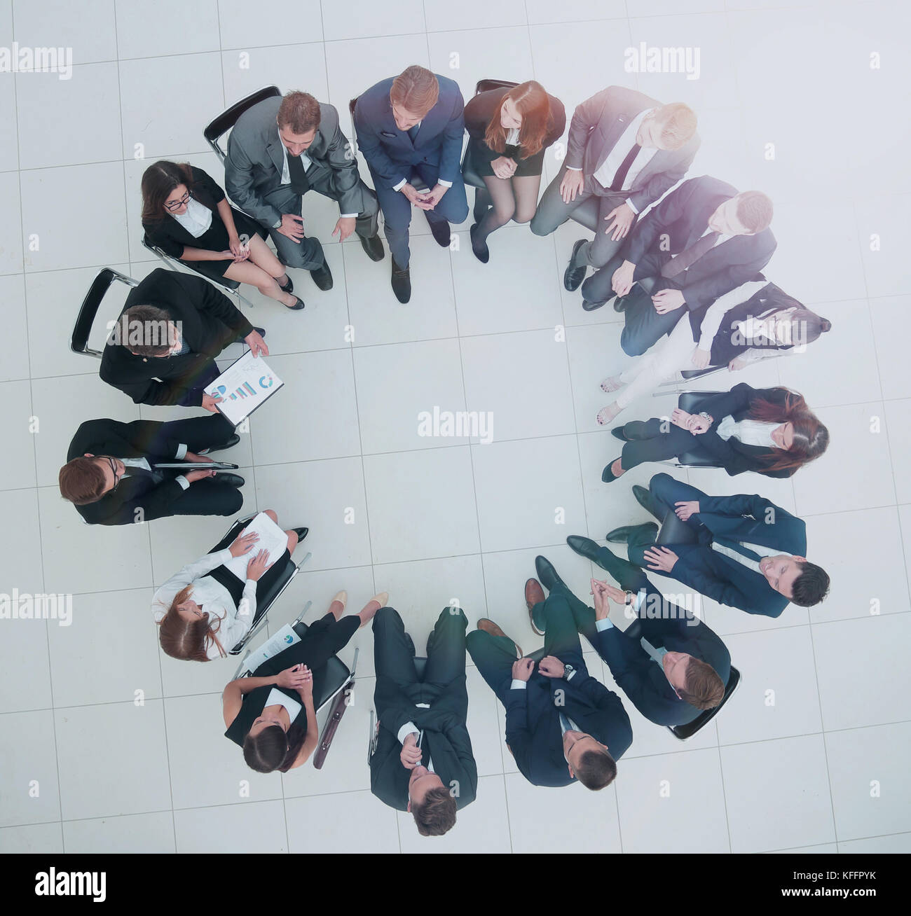 Staff discussing in a formal setting Stock Photo - Alamy