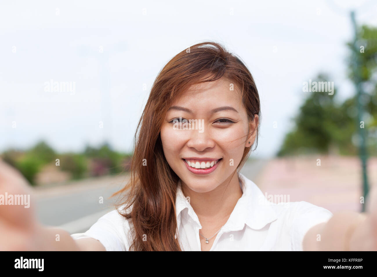 Beautiful chinese girl posing camera hi-res stock photography and images - Alamy
