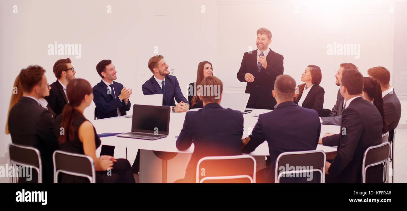 Businesspeople Sitting At Conference Round Table At The Meeting Stock ...