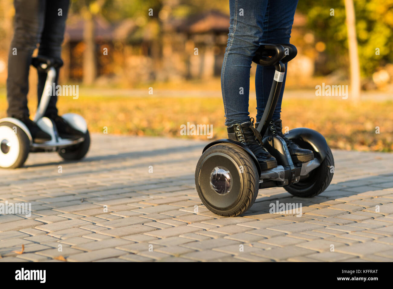 Male legs on electrical scooter outdoors gyroscooter Stock Photo - Alamy