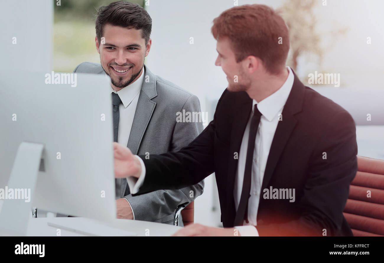 Business men discussing together business plans Stock Photo - Alamy