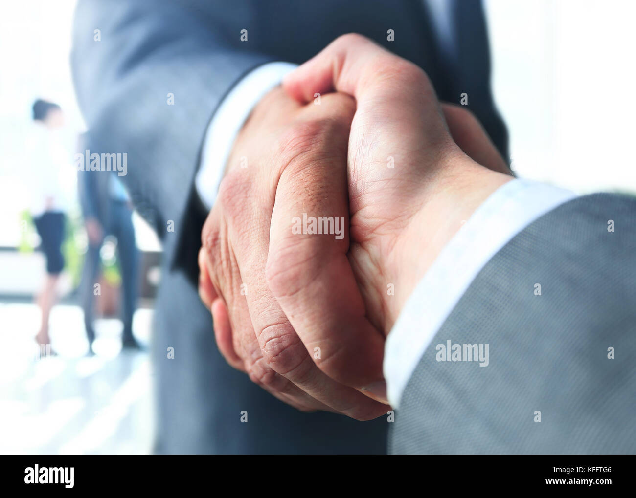 Closeup of a business handshake Stock Photo - Alamy