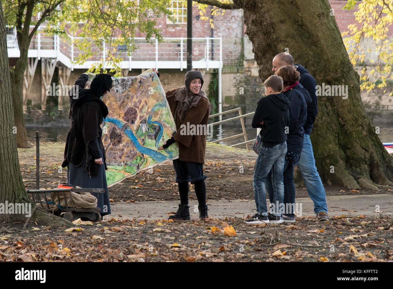 Street entertainers and audience in Tower Gardens, York Stock Photo - Alamy