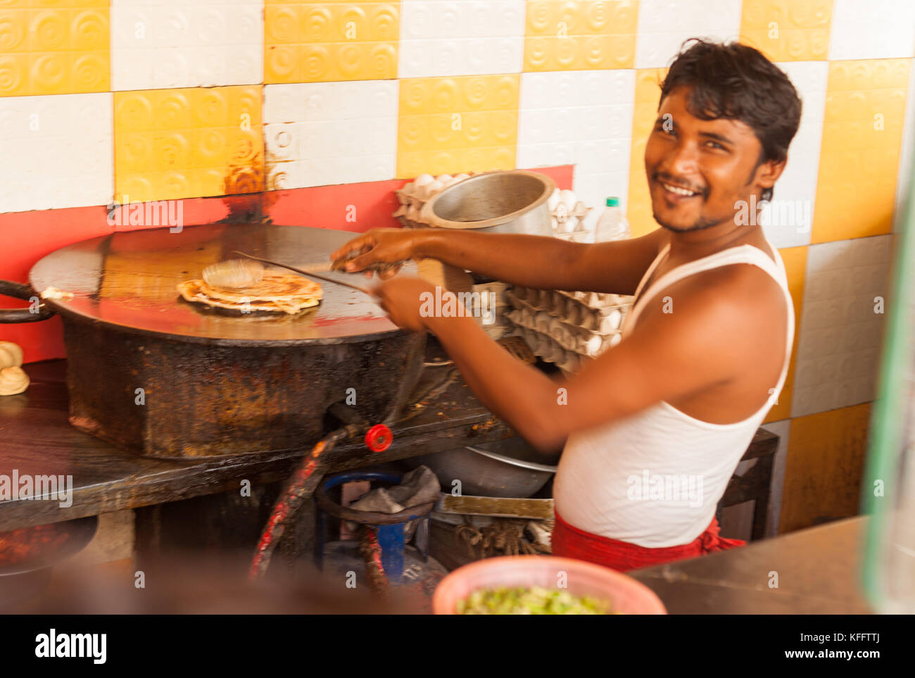 Kolkata Street Food Vendor Prepares A Classic Bengali Egg Roll Stock kolkata-street-food-vendor-prepares-a-classic-bengali-egg-roll-stock