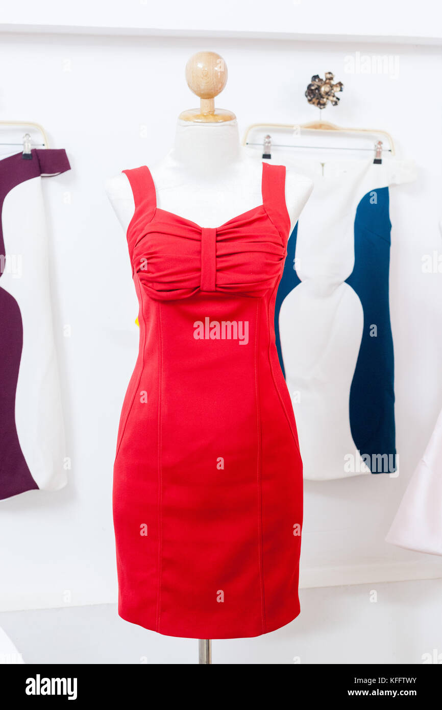 Bright red dress in a shop Stock Photo - Alamy