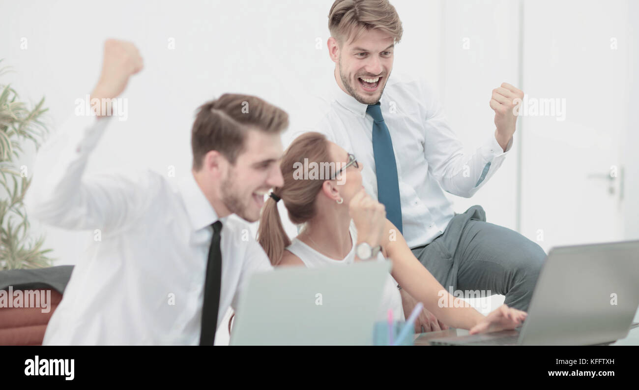 Business team celebrating a triumph with arms up Stock Photo - Alamy