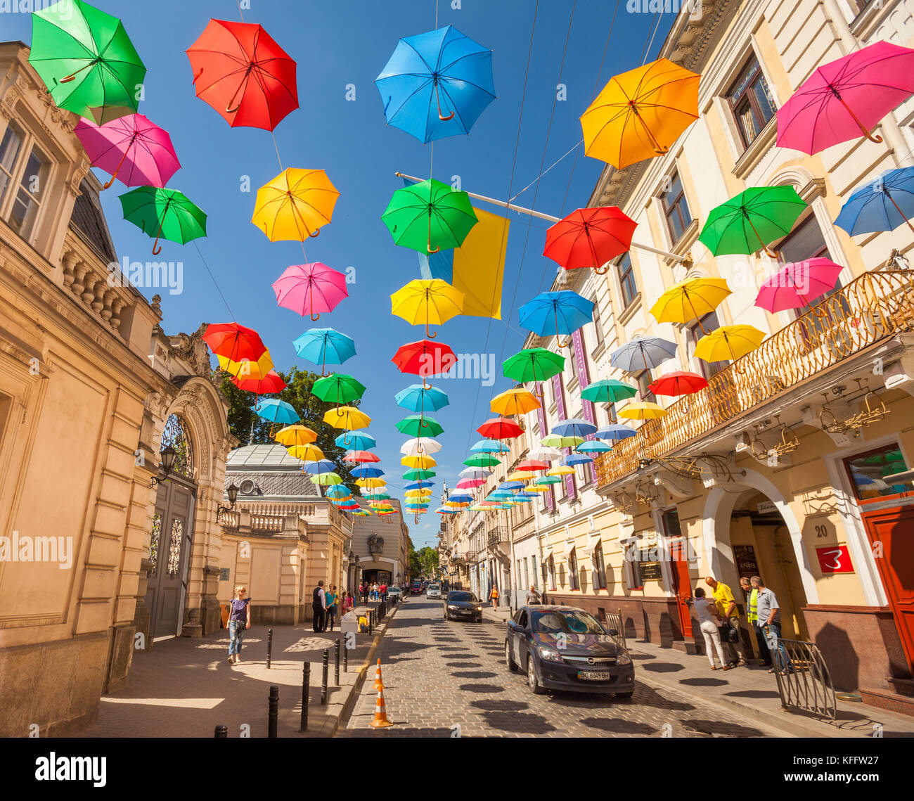 Umbrellas suspended over the street in front of the Lviv Art Palace ...
