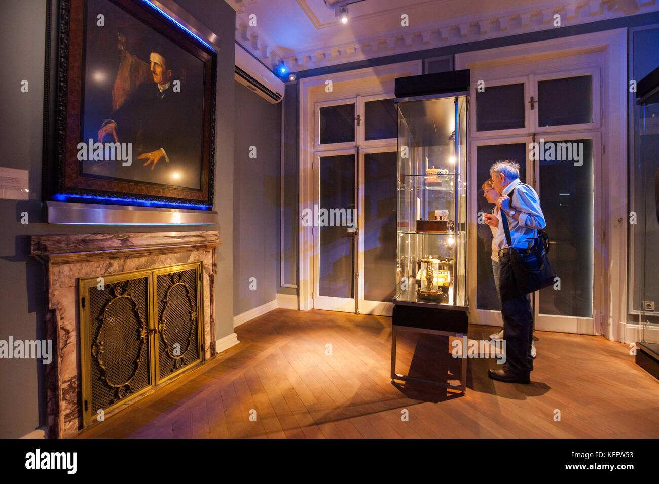 A man and a woman examine exhibits at the Nikola Tesla Museum in ...