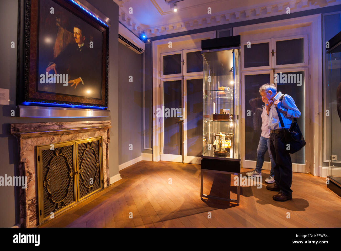 A man and a woman examine exhibits at the Nikola Tesla Museum in ...