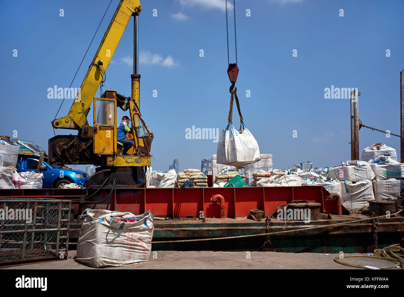 Crane loading boats hi-res stock photography and images - Alamy