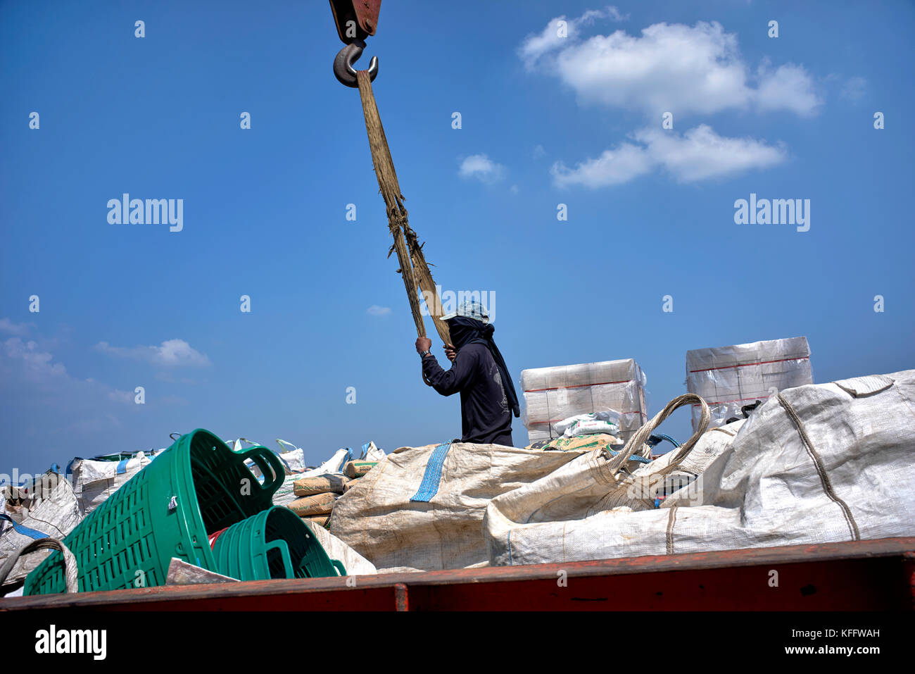 Crane boat loading and unloading area. Pattaya commercial shipping port ...