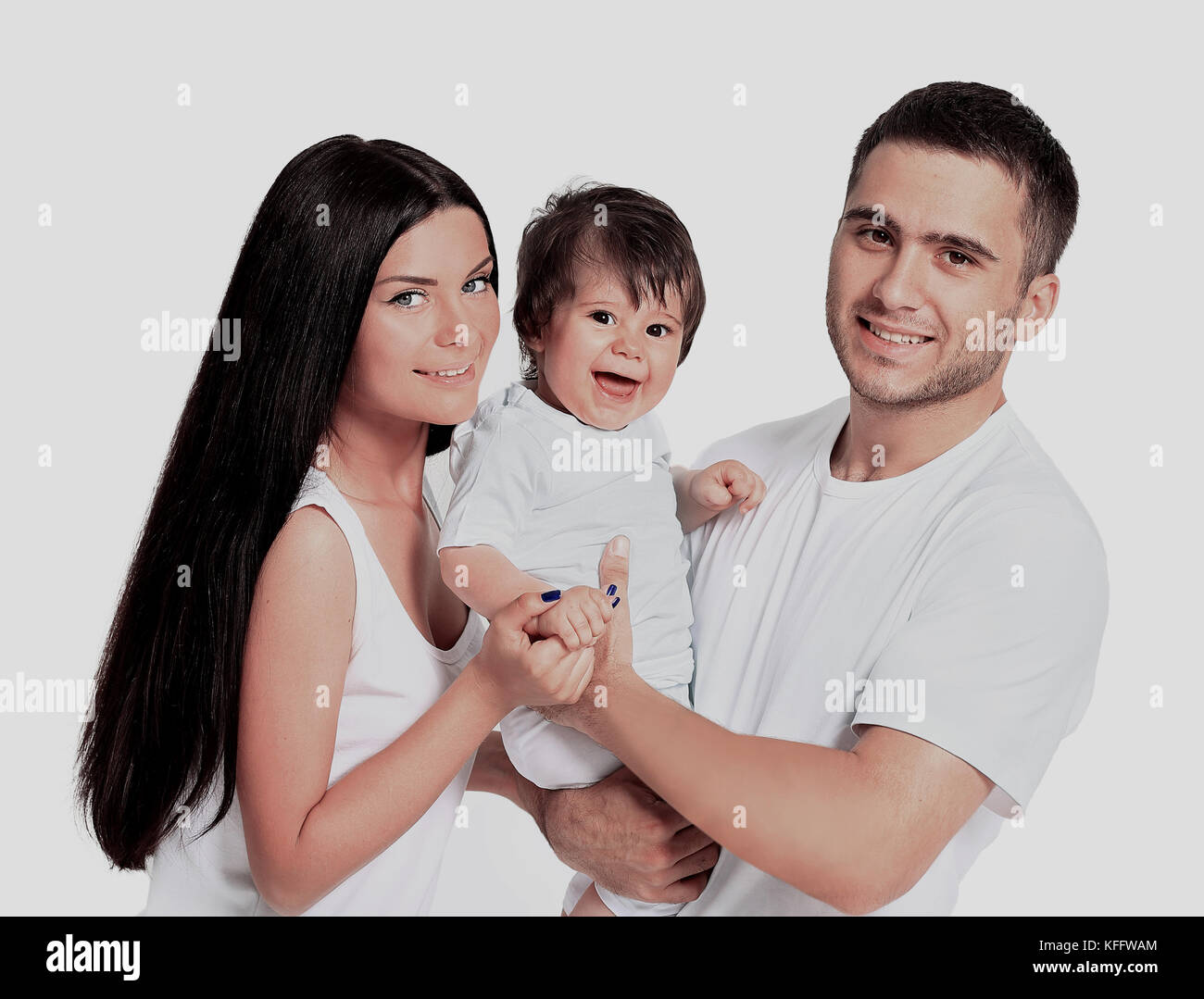 Happy family with child posing on white background Stock Photo - Alamy