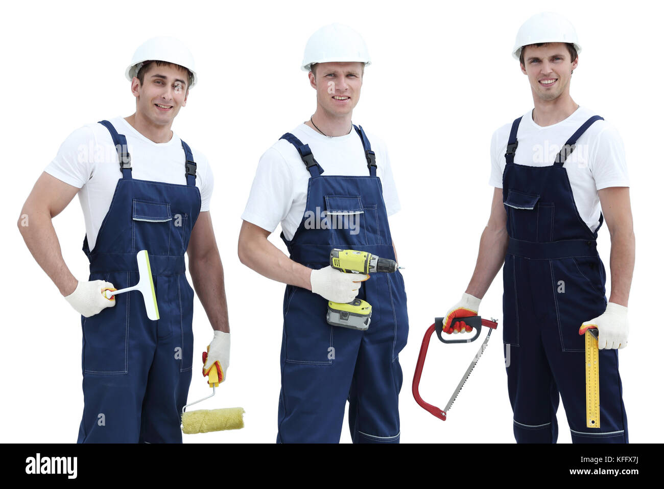 Group of builders in overalls isolated on white background Stock Photo ...