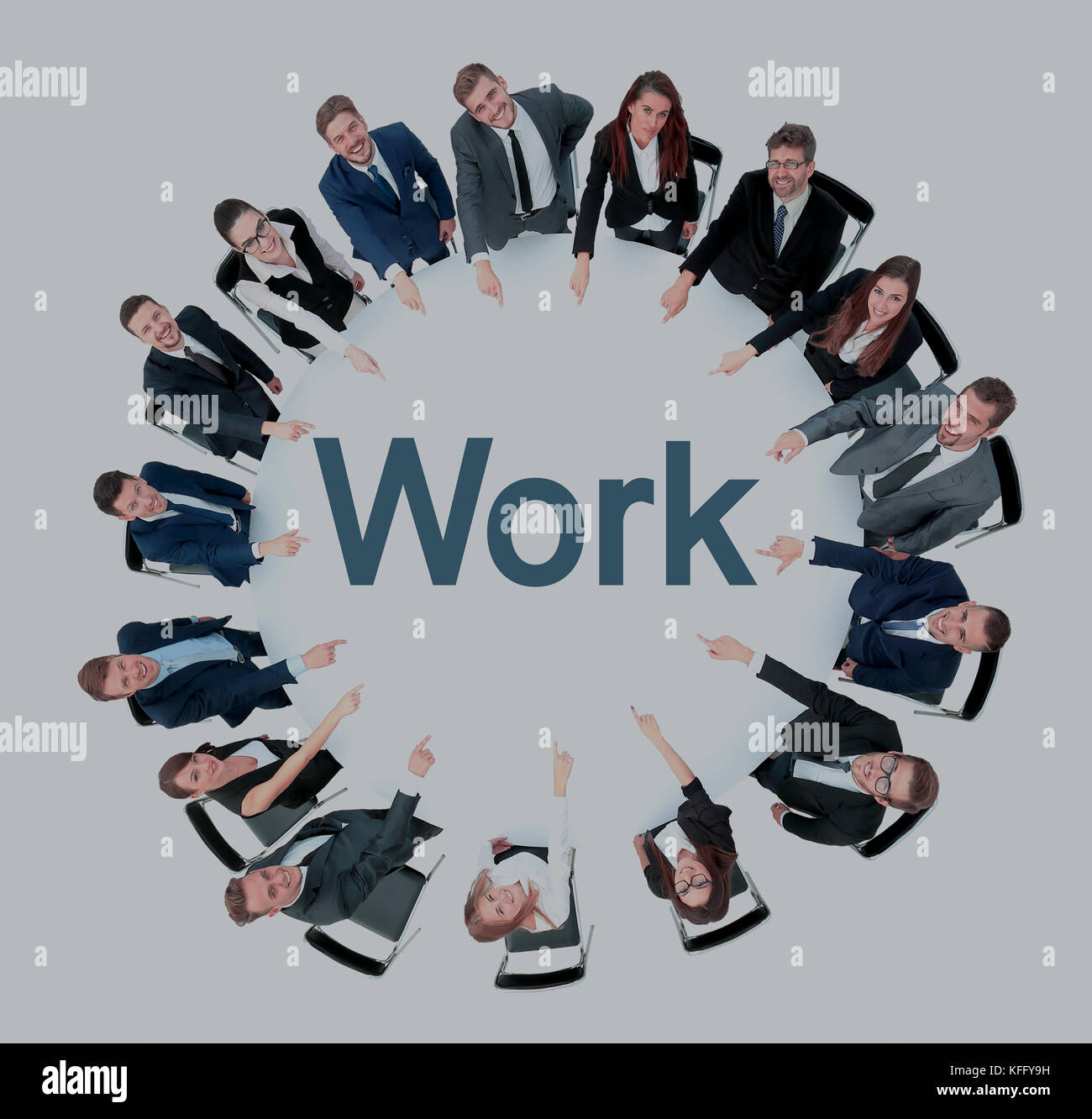 Happy business team pointing at something Stock Photo - Alamy