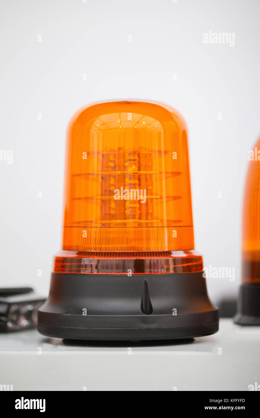 Orange flasher stand alone in exhibition Stock Photo - Alamy