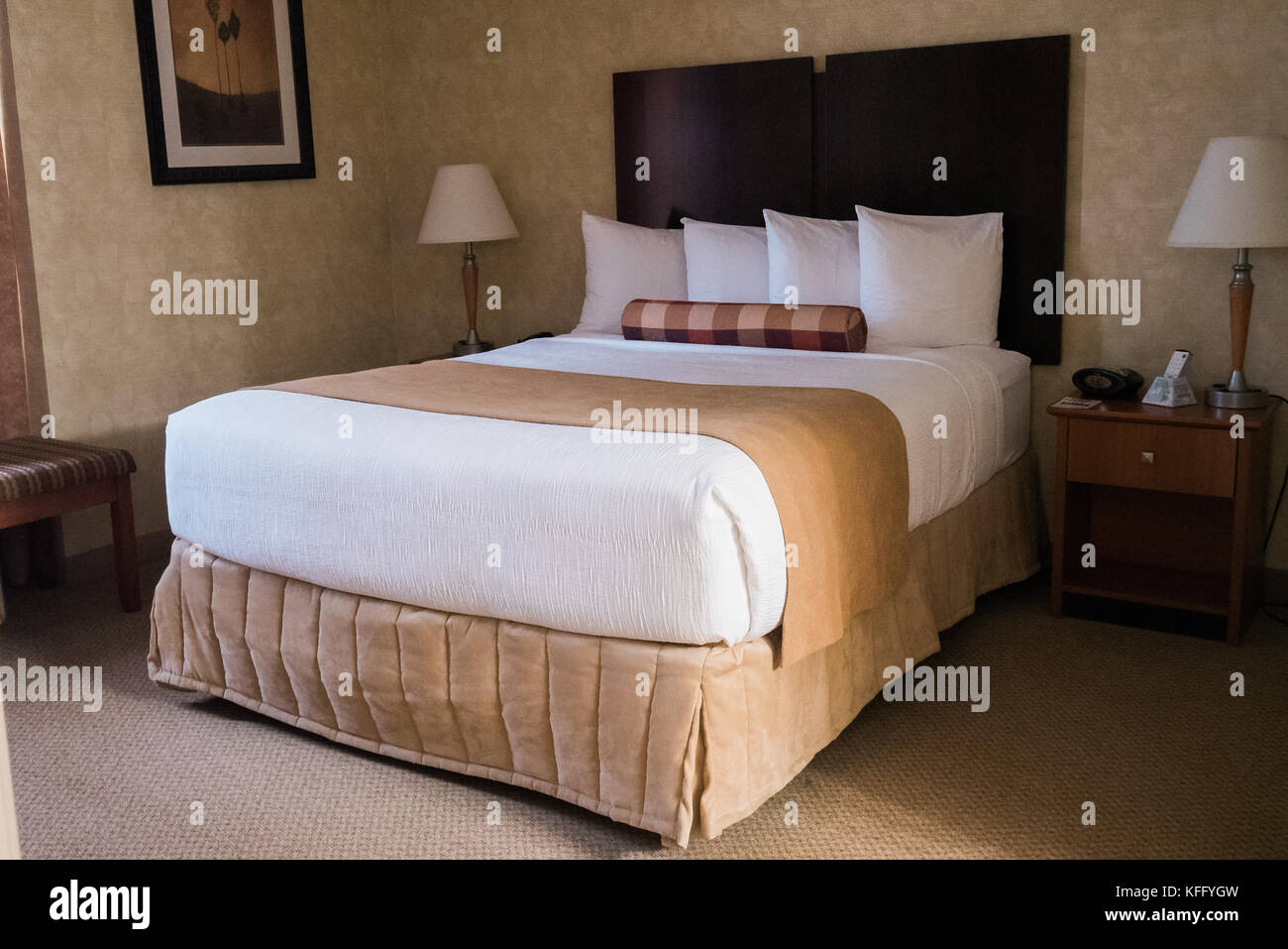 A tidy bed in a hotel room Stock Photo - Alamy