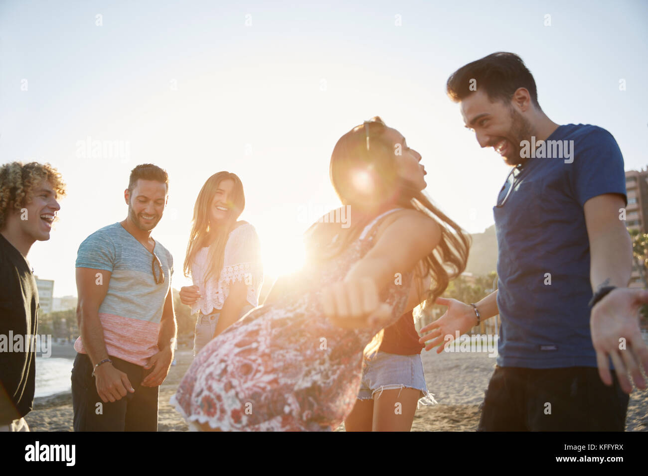 Couple dancing on beach hi-res stock photography and images - Alamy