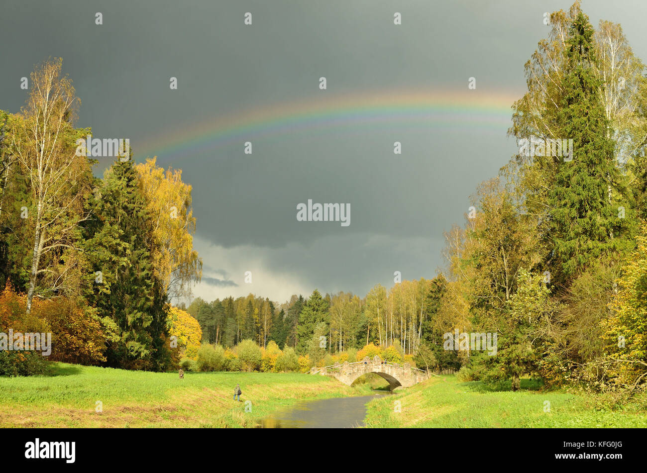 A beautiful rainbow appeared in the sky after the rain Stock Photo - Alamy
