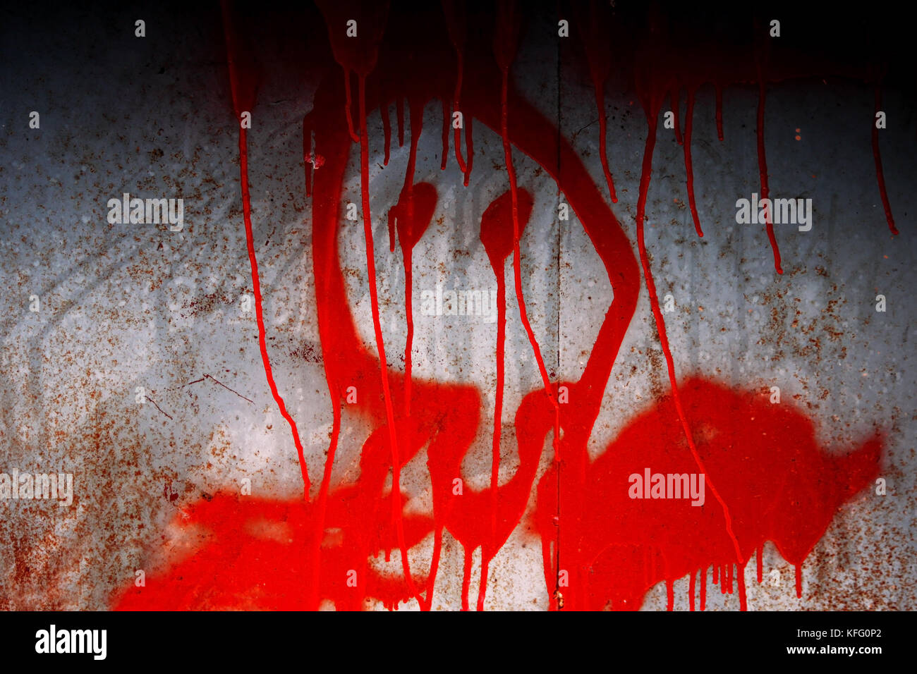 graffiti red skull painted on the door with paint. concept of halloween ...