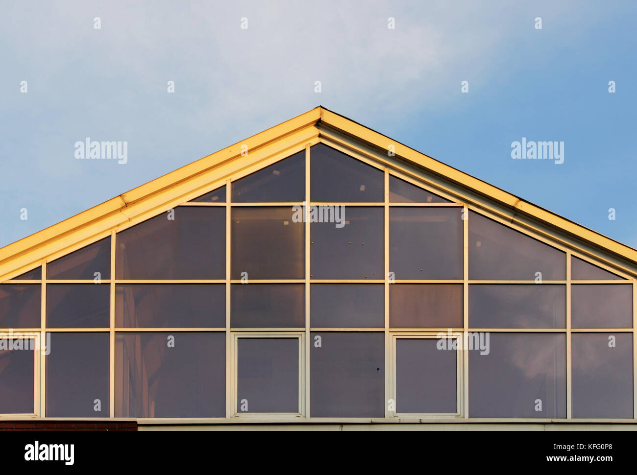 Many glass large windows in the house on a blue sky background Stock ...