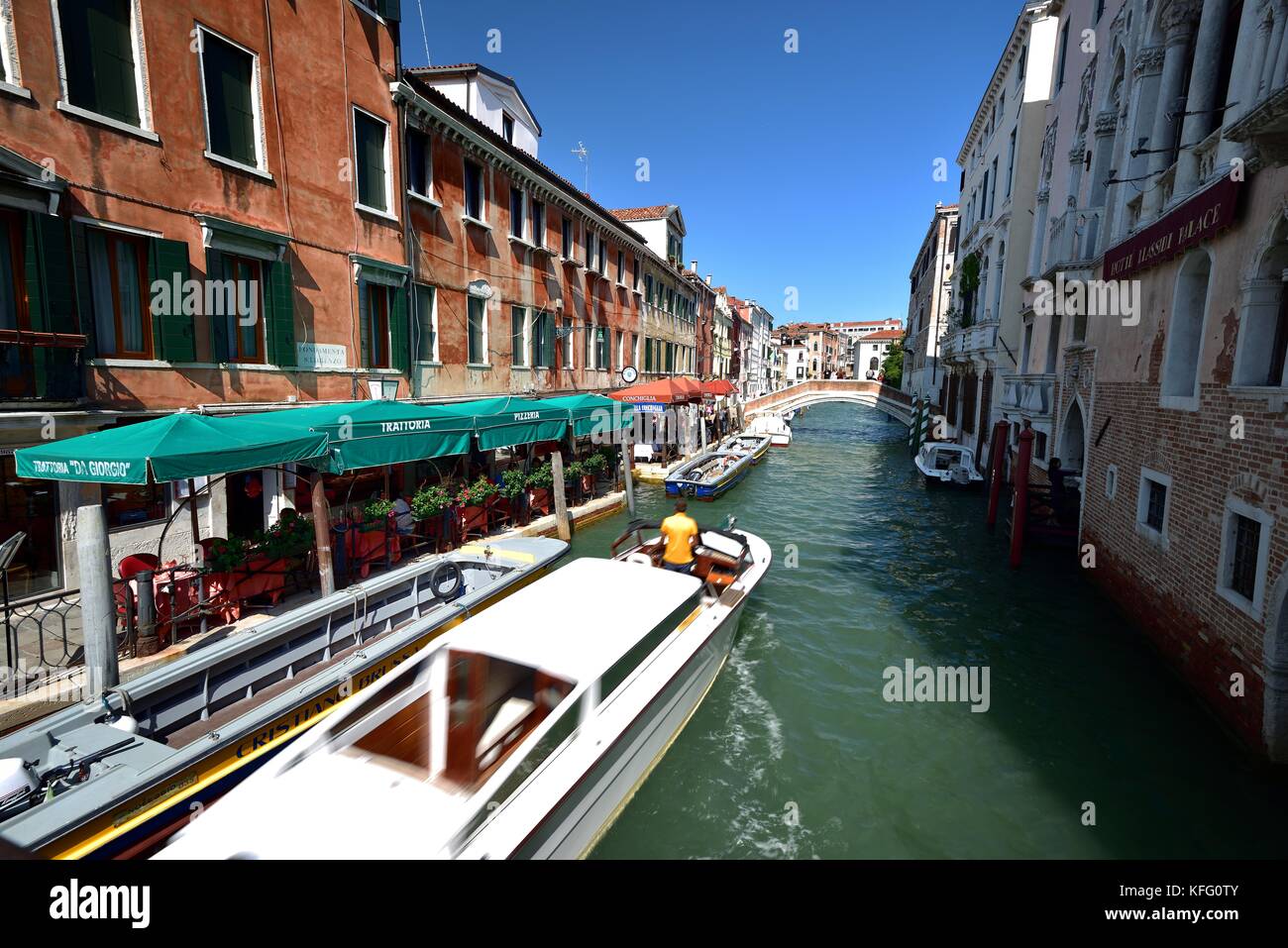 Restaurant along the canal in Venice Italy Stock Photo - Alamy