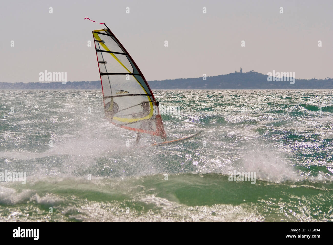 Wind surfer in the spray during a windy day in French Riviera Stock ...