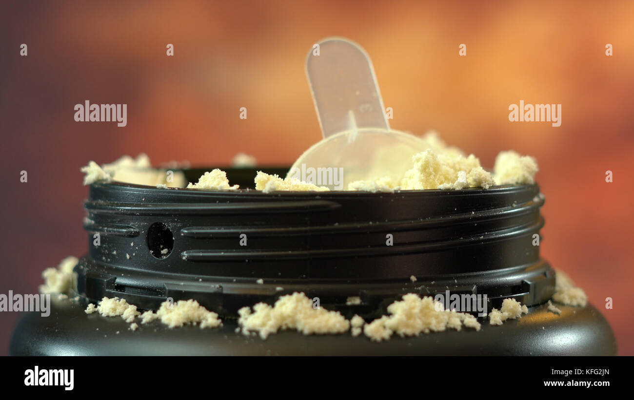 Macro close up of container of pure nutritional supplement whey protein ...