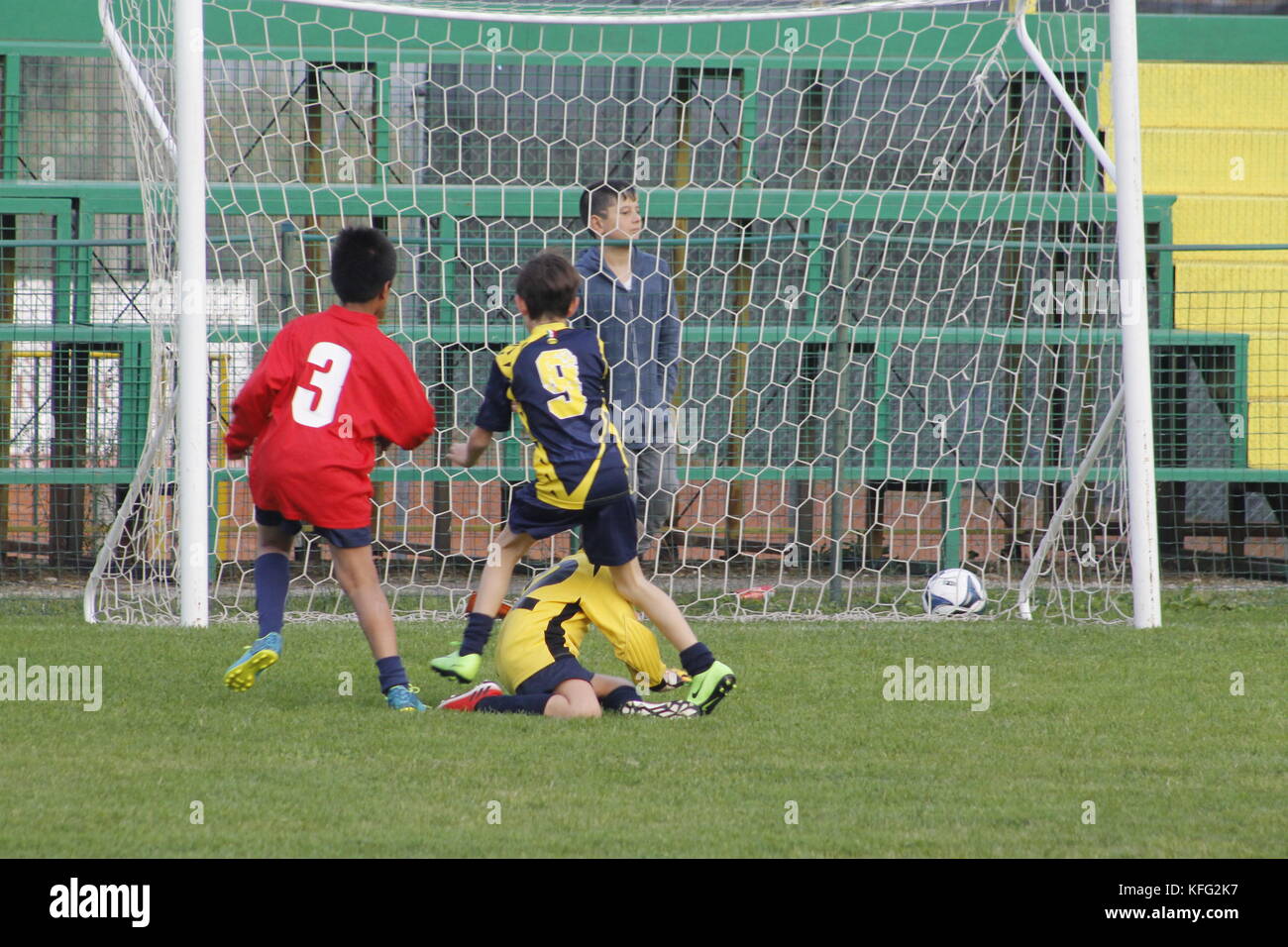 Young players play soccer Stock Photo - Alamy