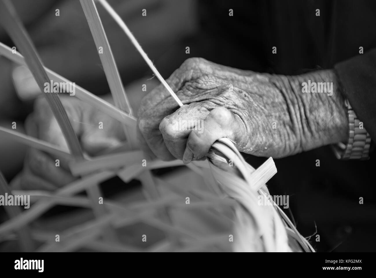 Old weavers hand, Hoi An, Vietnam Stock Photo - Alamy