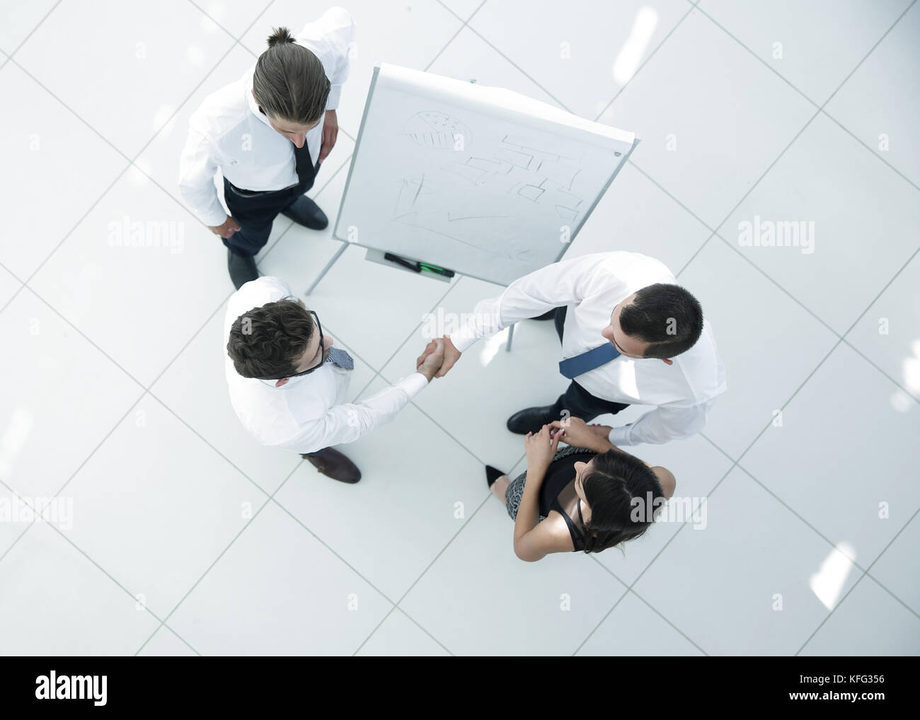 view from the top. background image of handshake of business partners ...