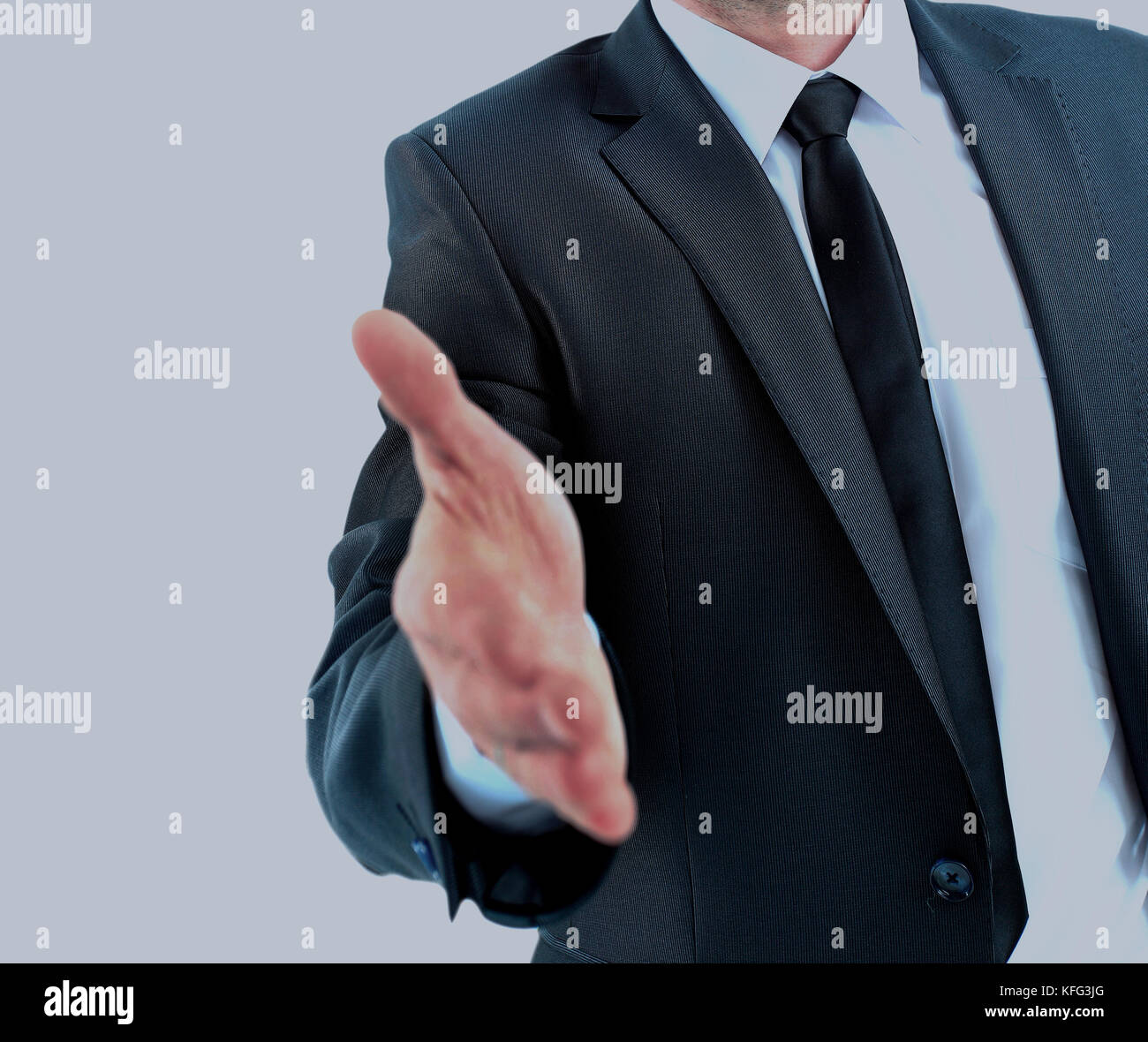 Business man saying welcome and giving hand Stock Photo - Alamy