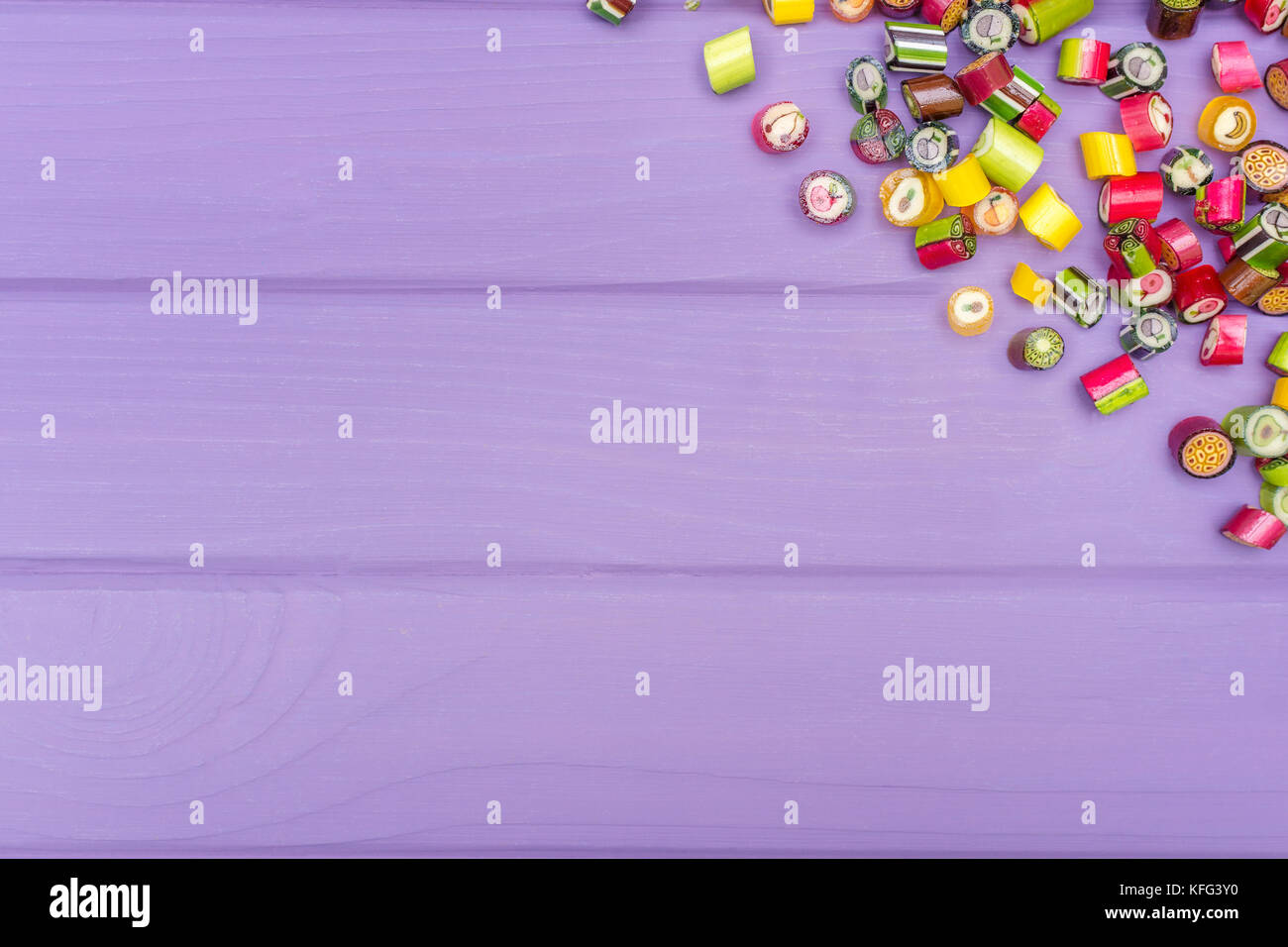 A corner frame made of colored caramel candies Stock Photo - Alamy